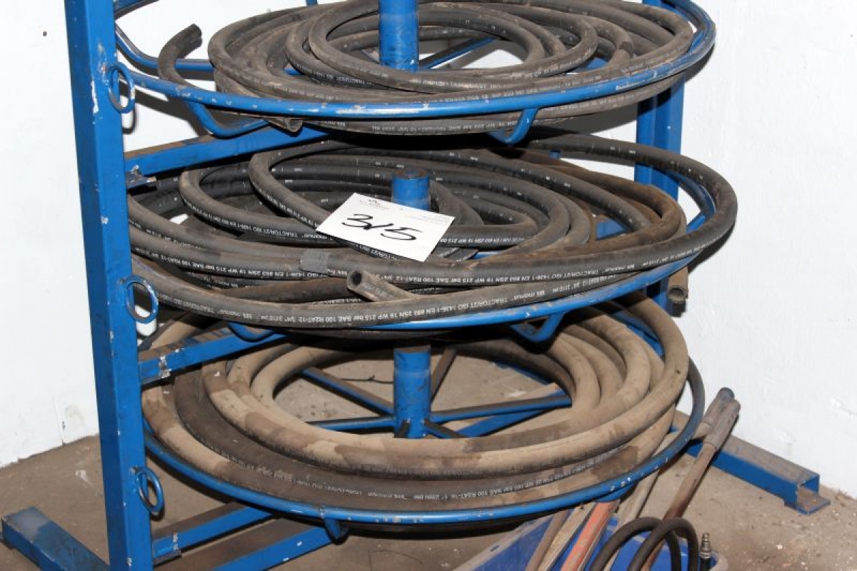 Hose Rack with hydraulic hoses + tools on the wall - KJ Auktion ...